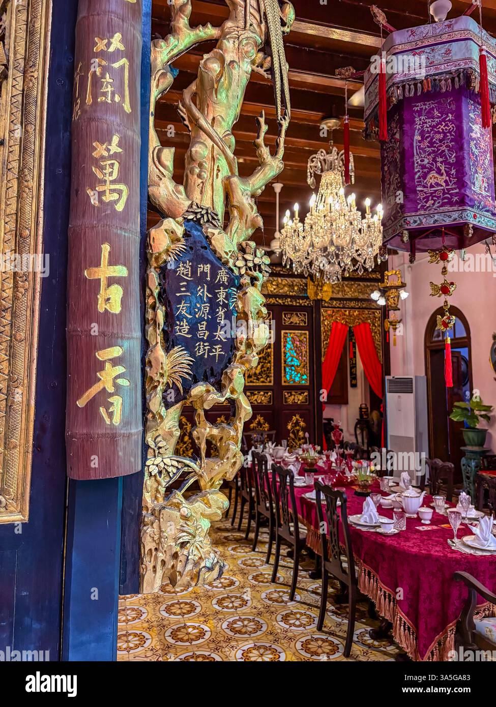 Dining Room with long table inside Pinang Peranakan Mansion, Georgetown ...