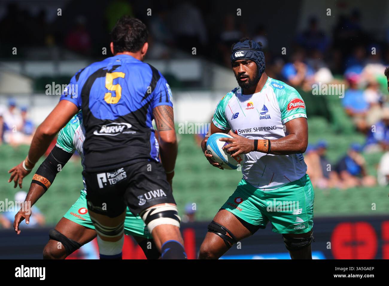 Isoa Nasilasila of Drua sizes up Darcy Swain of the Western Forceduring ...