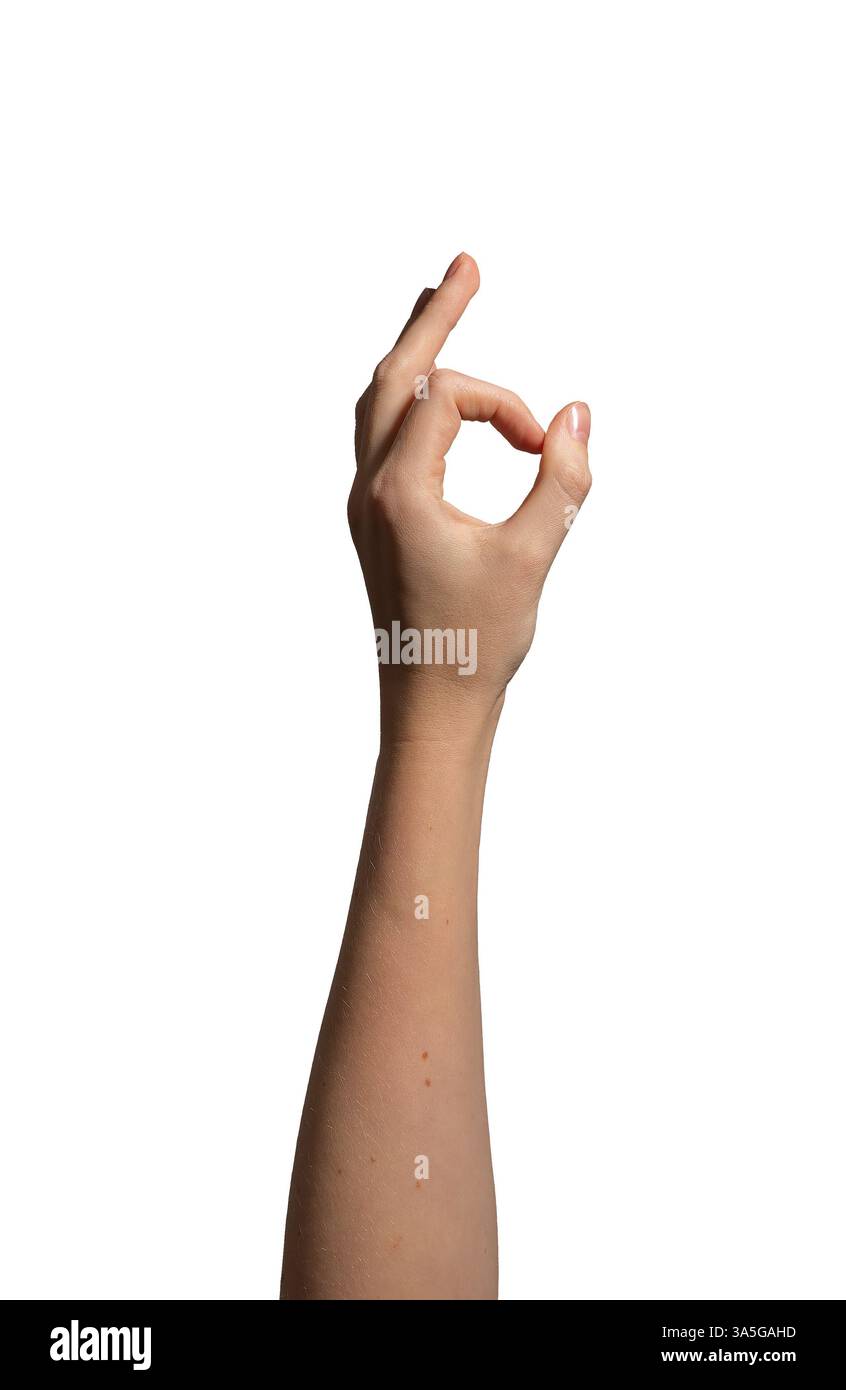 Hand making an OK sign with thumb and index finger forming a circle ...