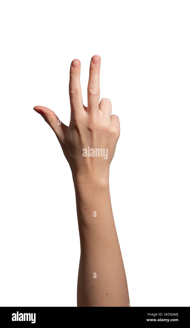 Female hand showing three fingers, with thumb, index, and middle ...
