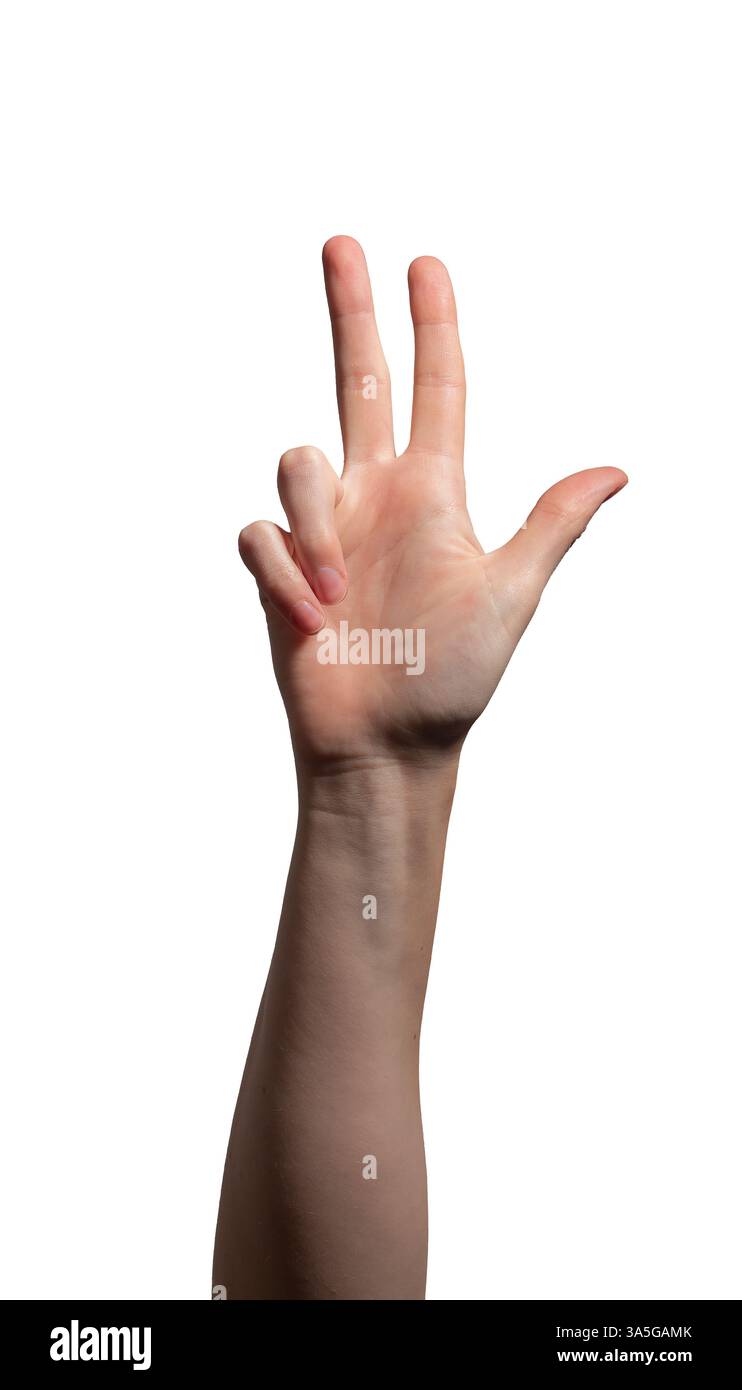 Female hand showing three fingers with the thumb, index, and middle ...