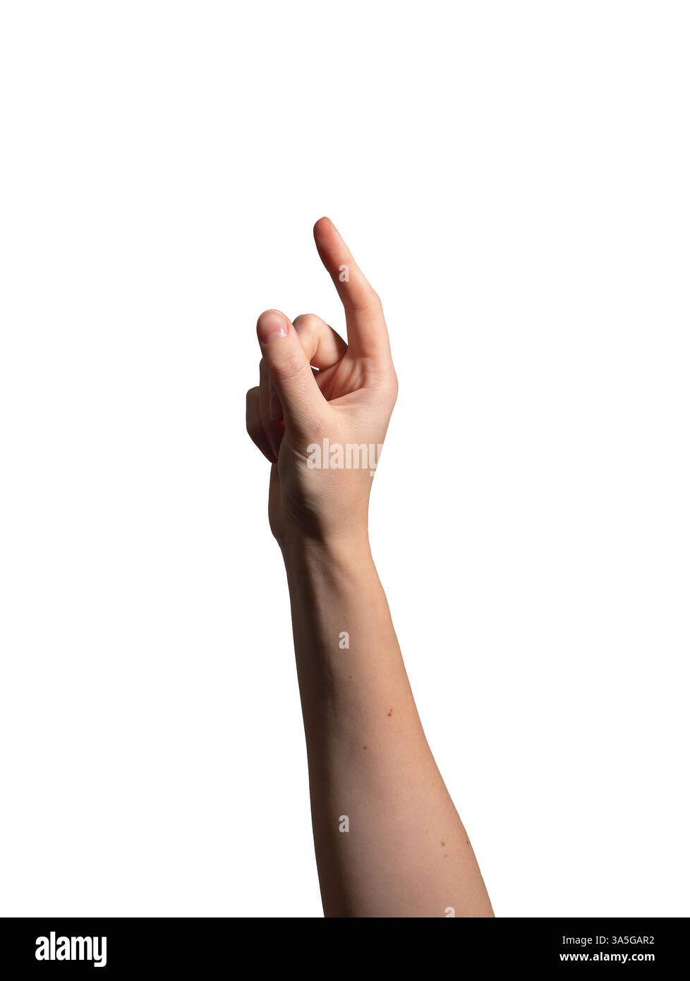 Female hand pointing upward with index finger extended, gesture symbolizing selection, direction ...