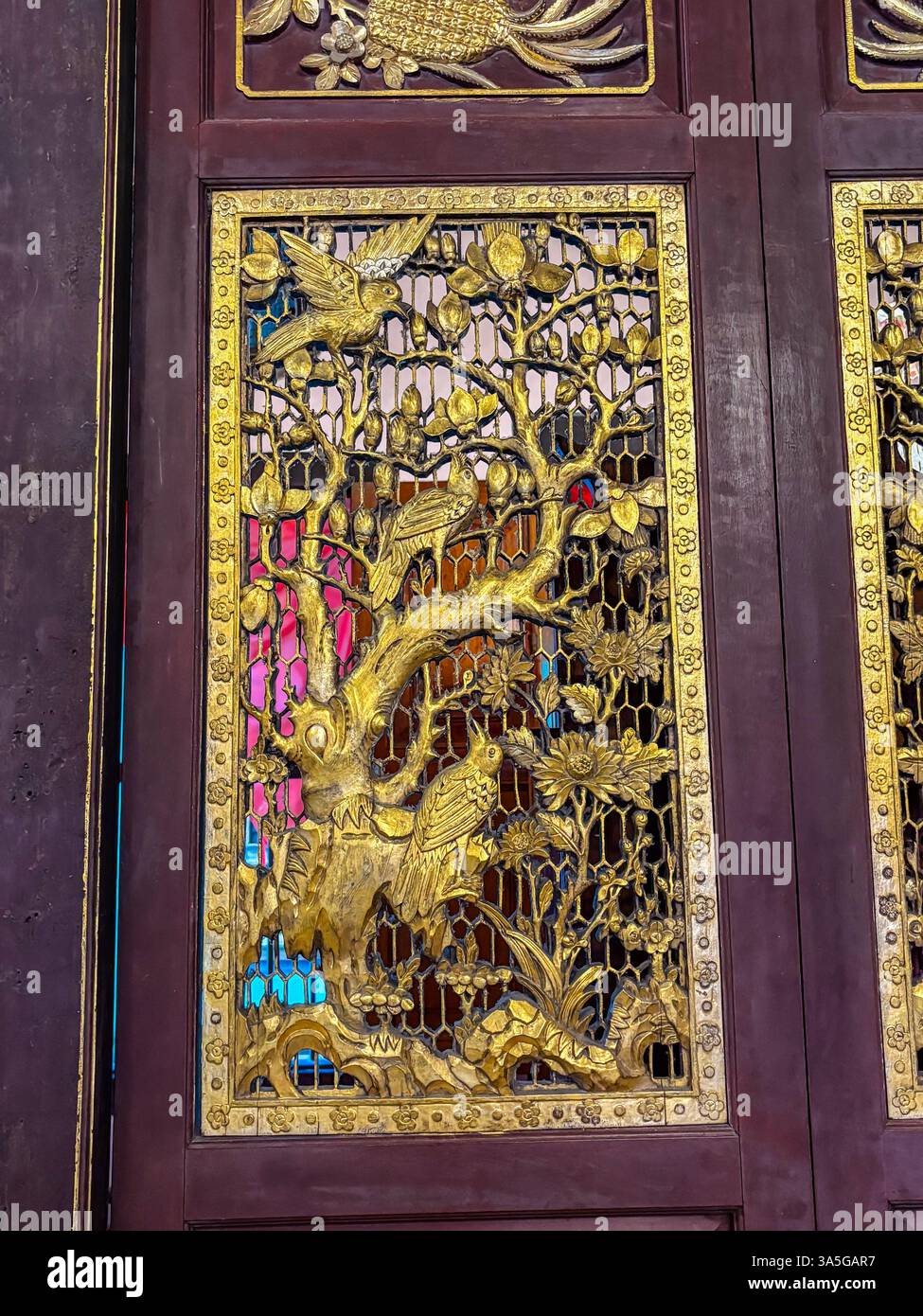 This frame shows a detailed shot of a door panel in Pinang Peranakan ...