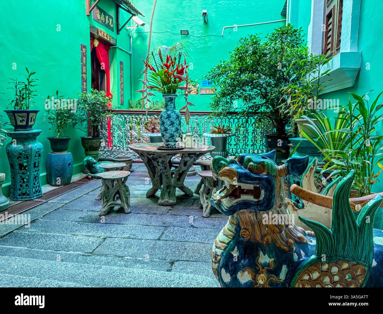 The photo captures the charm of Peranakan's courtyard, which is filled ...
