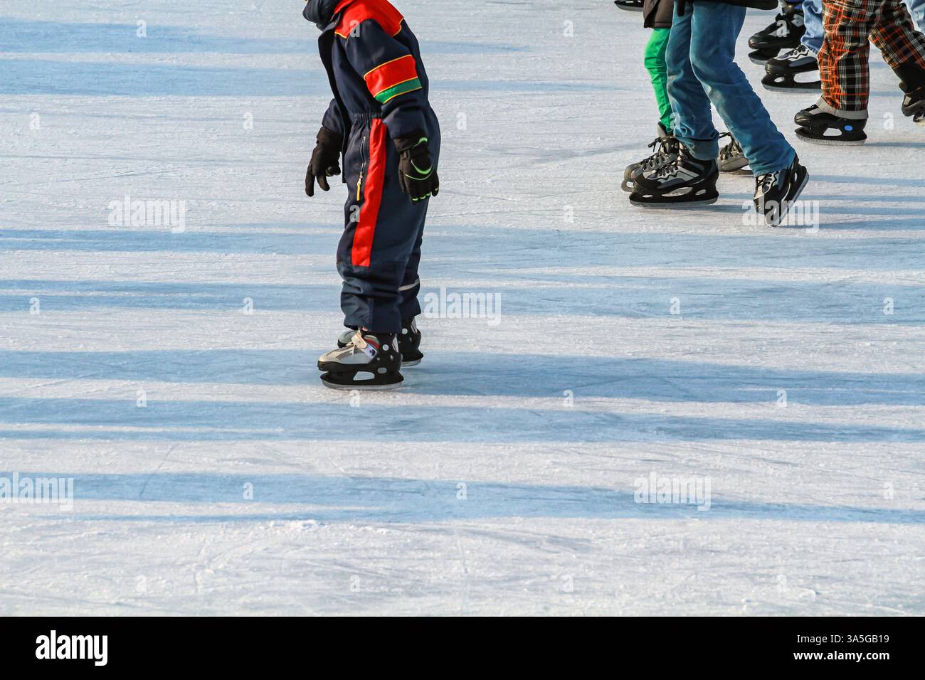 children skating on the ice rink Stock Photo - Alamy