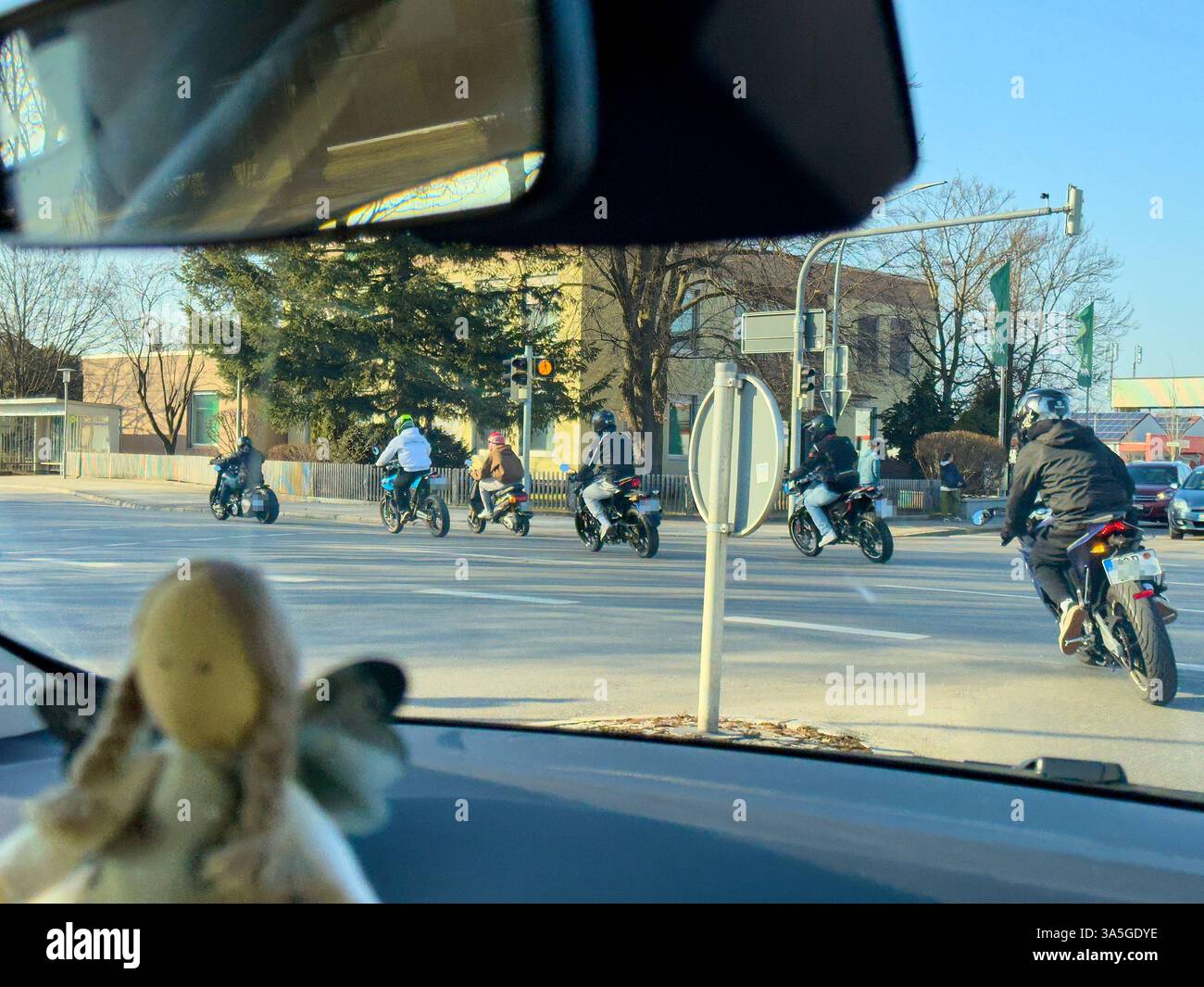 Group of motorcyclists riding their bikes on a sunny day in ...