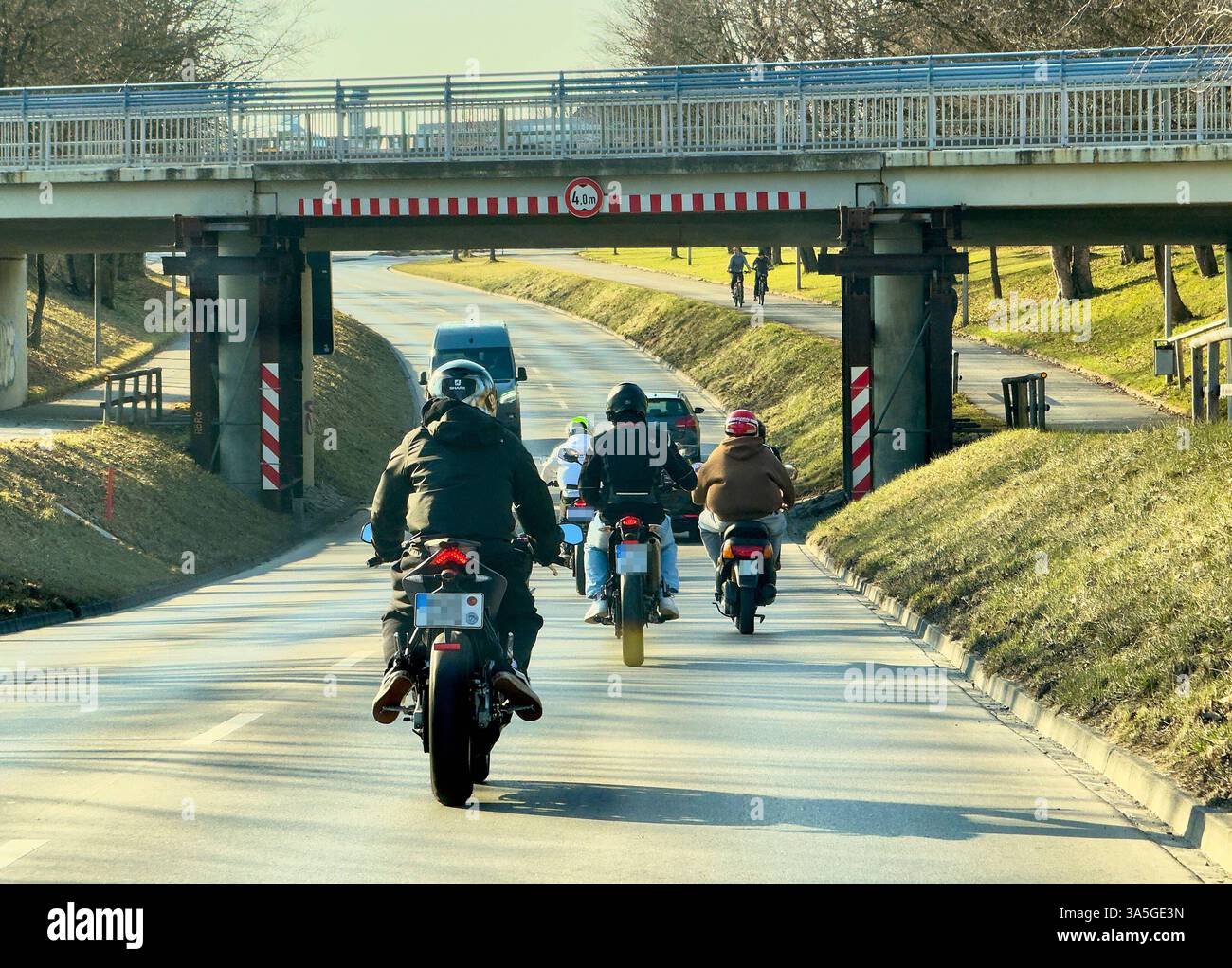 Group of motorcyclists riding their bikes on a sunny day in ...