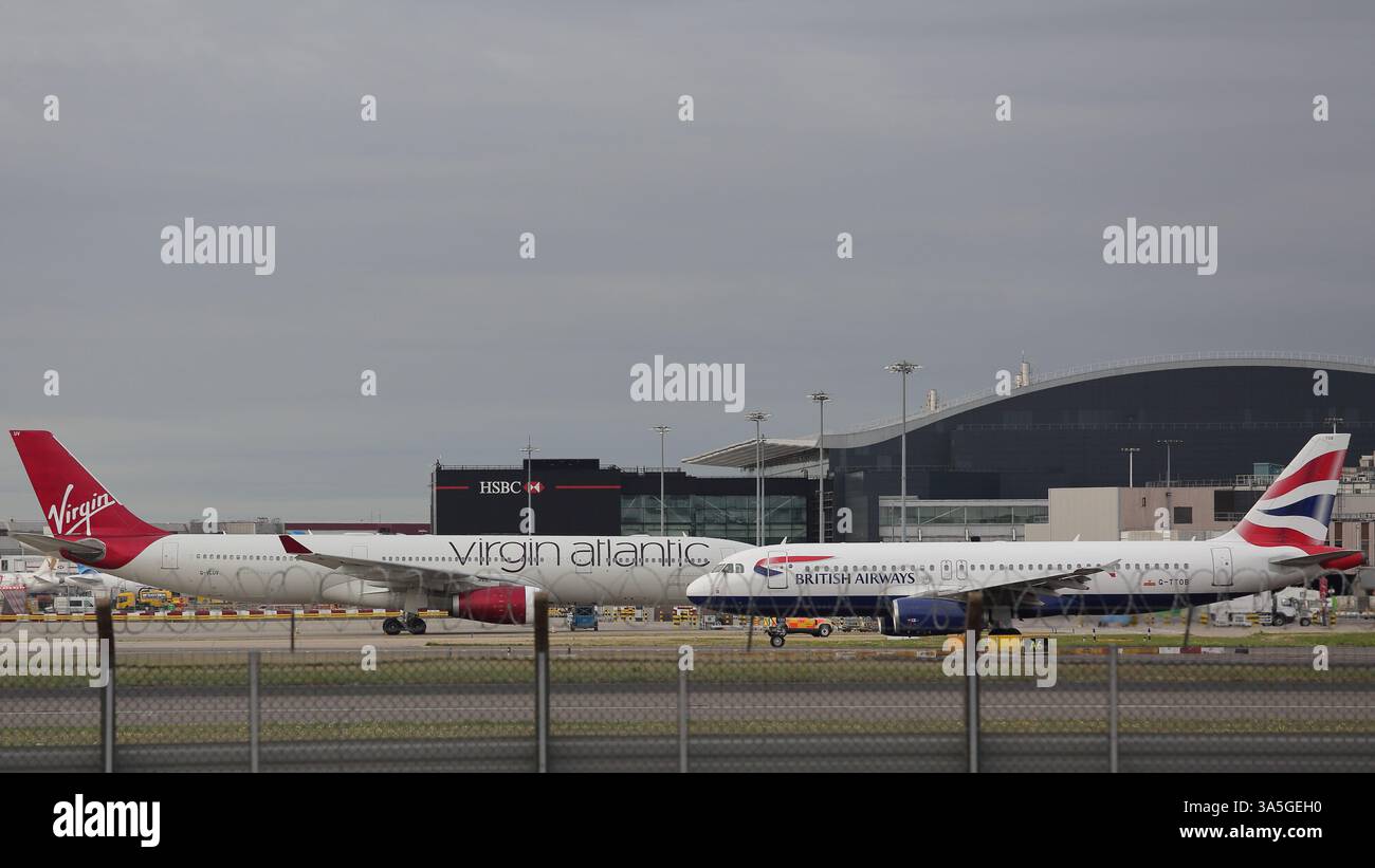 G-VLUV Virgin Atlantic Airbus A3300 and G-TTOB British Airways Airbus ...