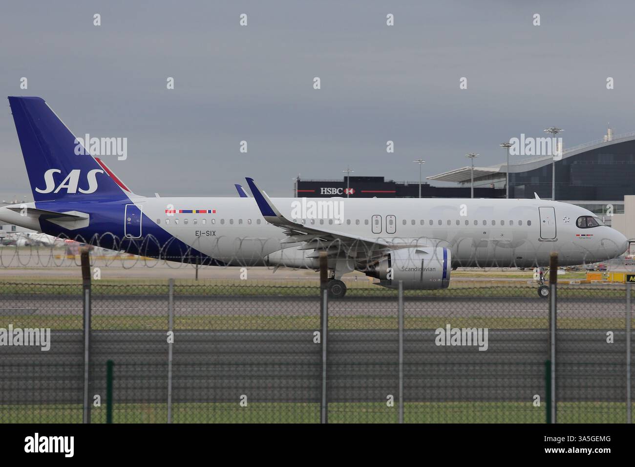 EI-SIX SAS Connect Airbus A320neo is taxiing on the runway at Heathrow ...