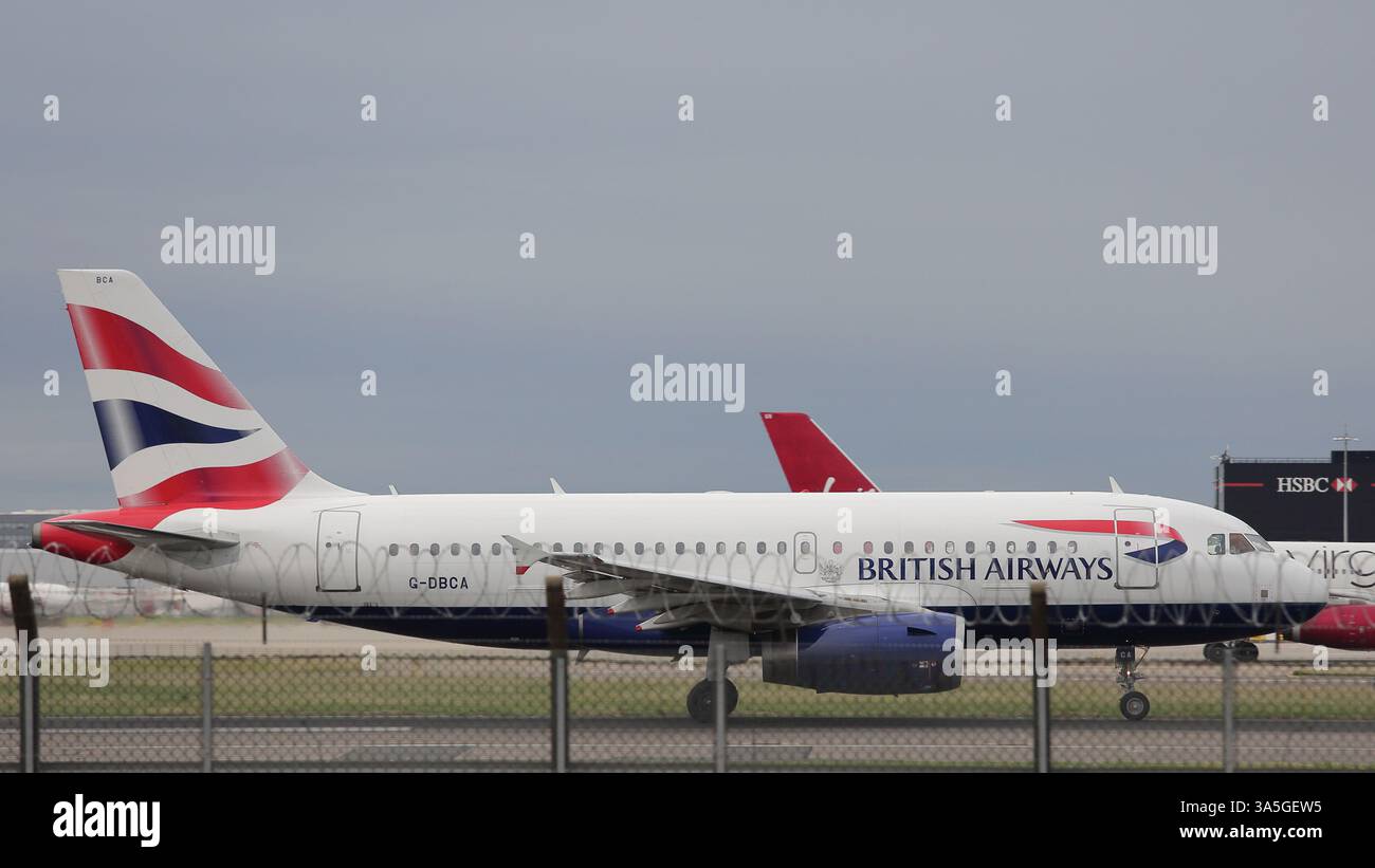 G-DBCA British Airways Airbus A319-100 is taxiing on the runway at ...