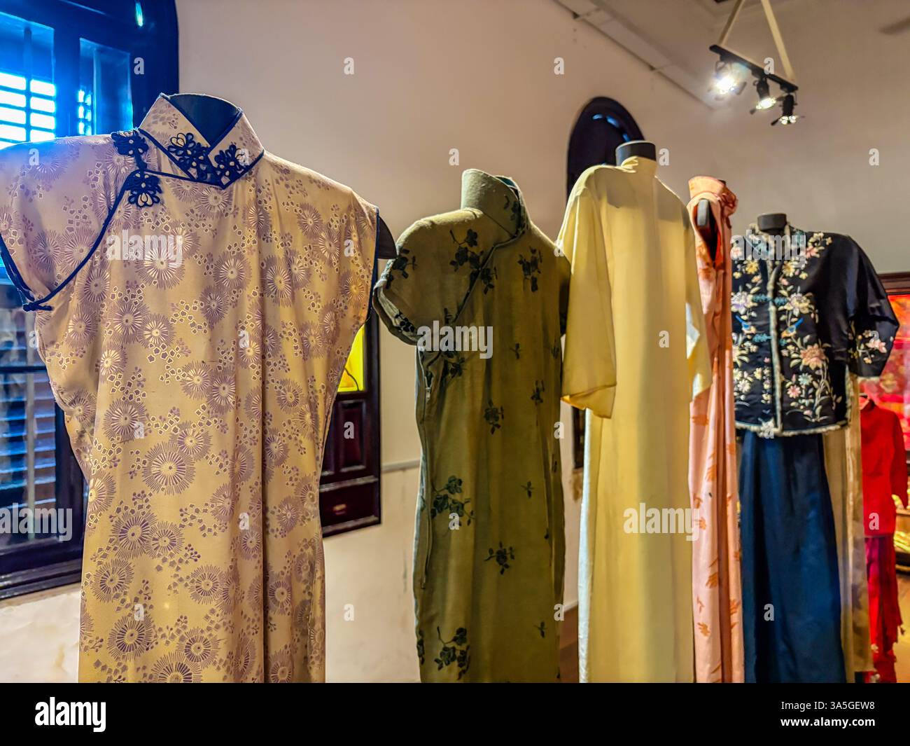 Display of historical clothing inside Cheong Fatt Tze Mansion (The Blue ...