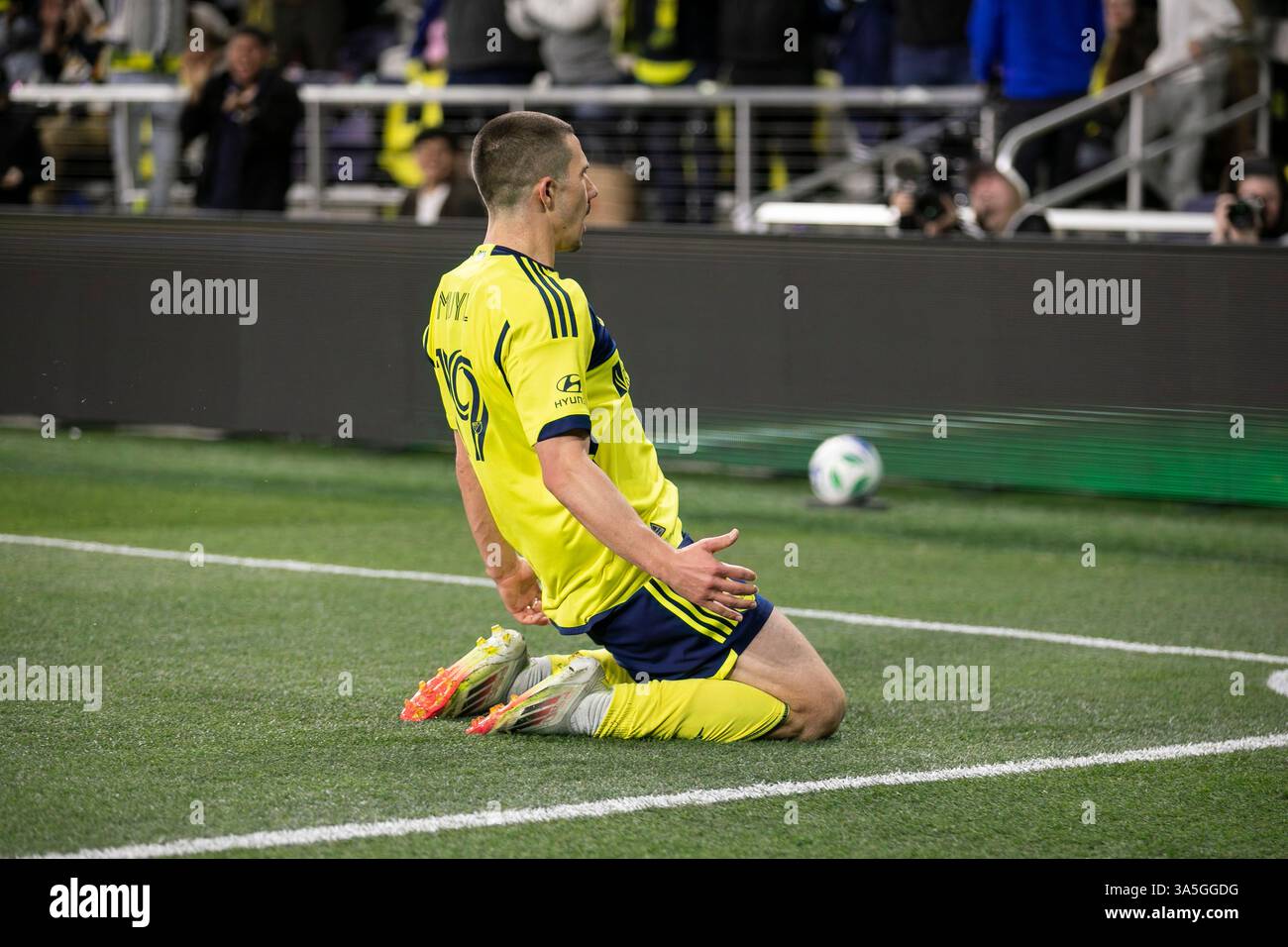 Nashville SC midfielder Alex Muyl (19) slides in celebration after ...