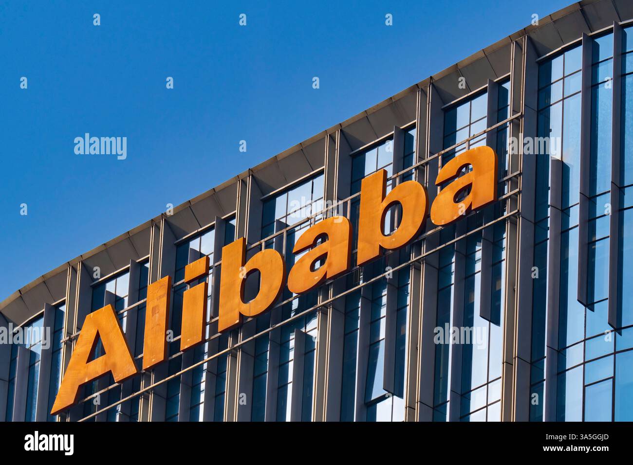 The logo of Alibaba Group on top of an office building in southwest ...