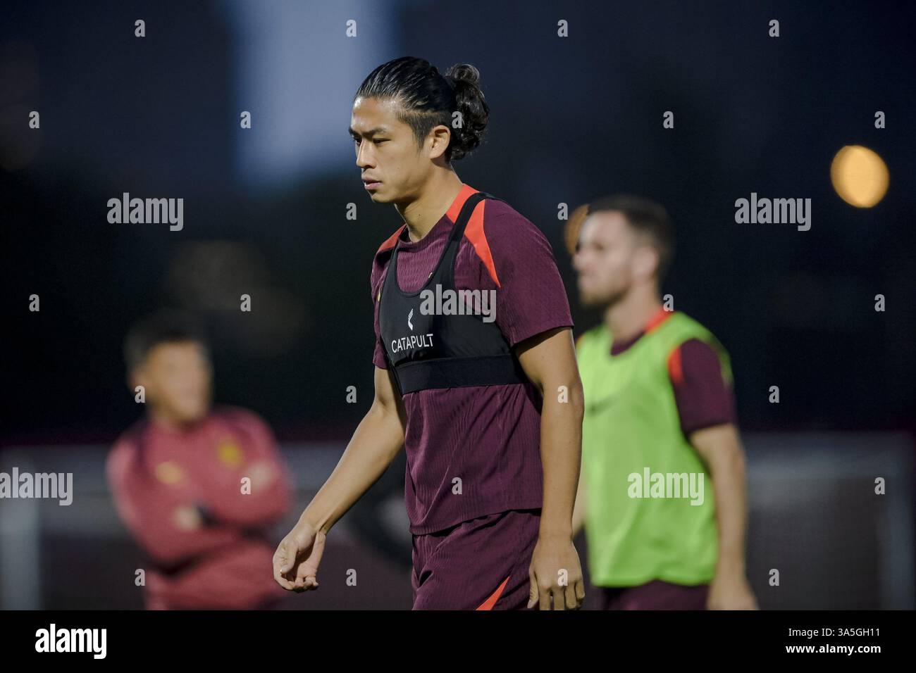 Hangzhou, China. 23rd Mar, 2025. Zhang Yuning (C) of China trains for ...
