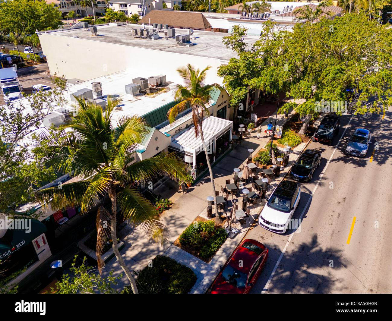 Naples, FL, USA - March 19, 2025: Aerial photo of upscale shops at Old ...