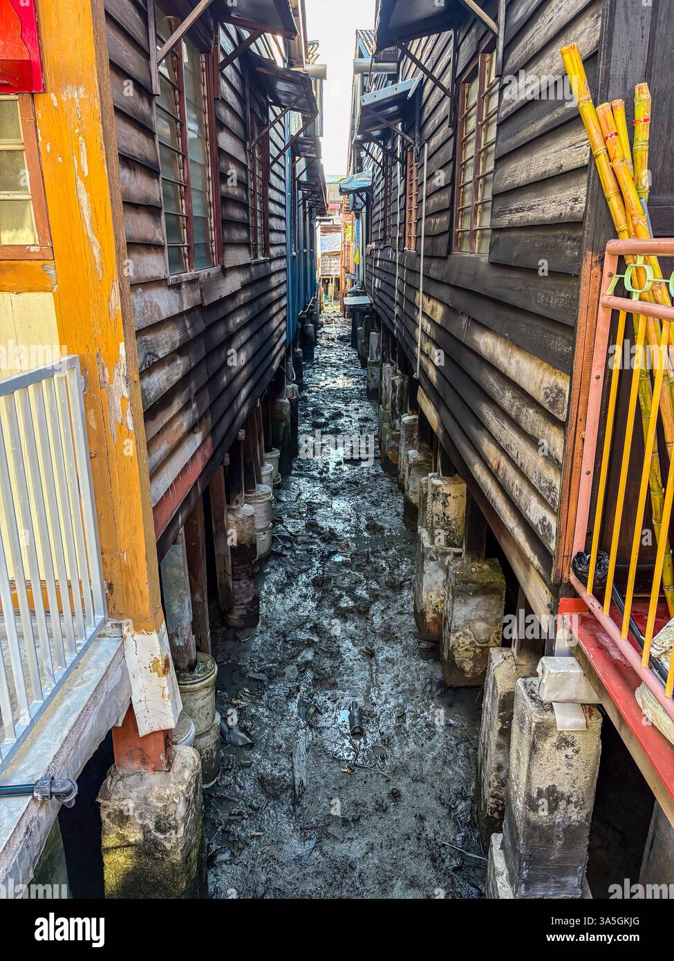 The gap between houses under the stilt structures of Chew Jetty clan ...