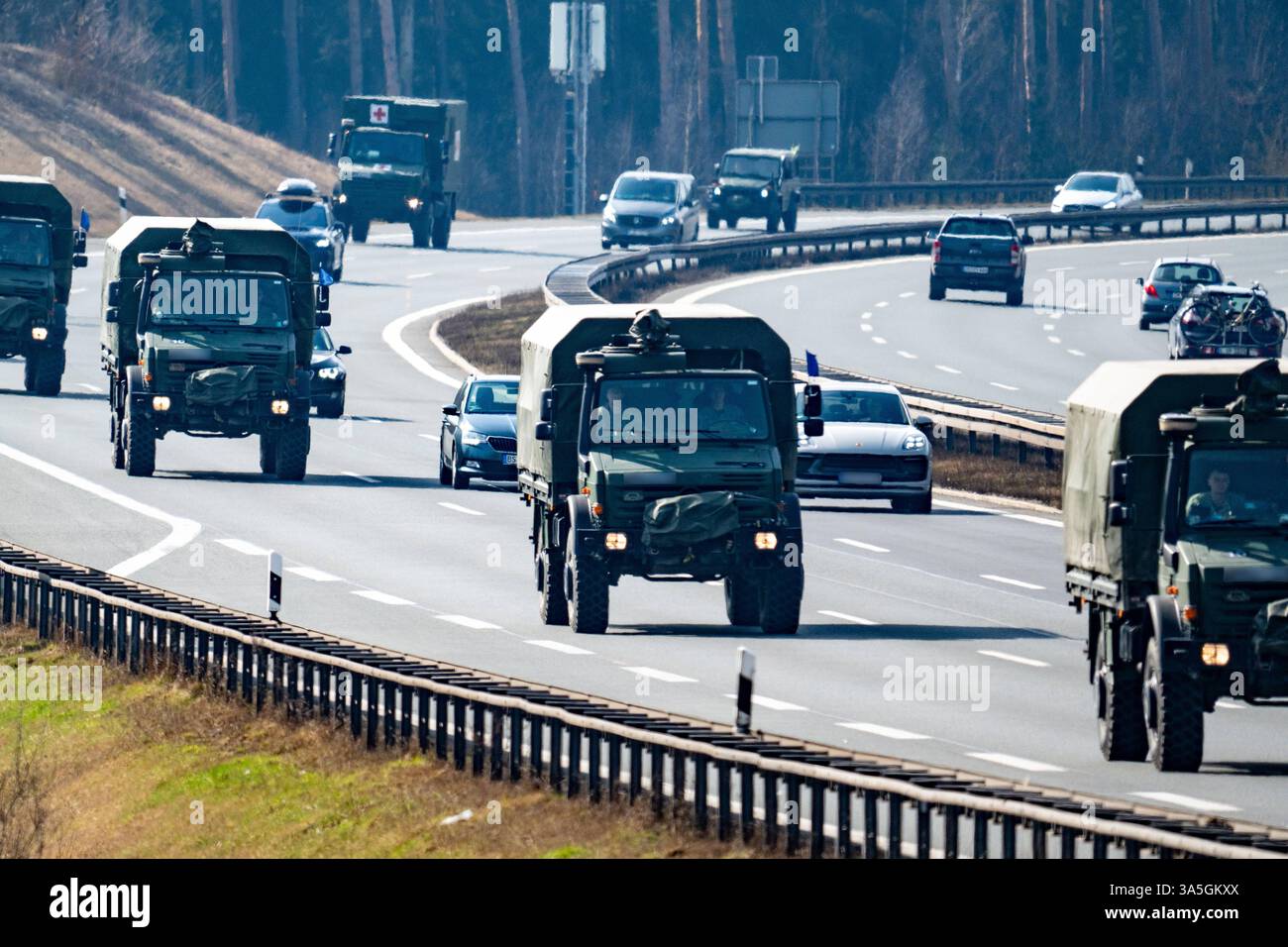 A9, Germany - March 23, 2025: Convoy of several military vehicles on a ...