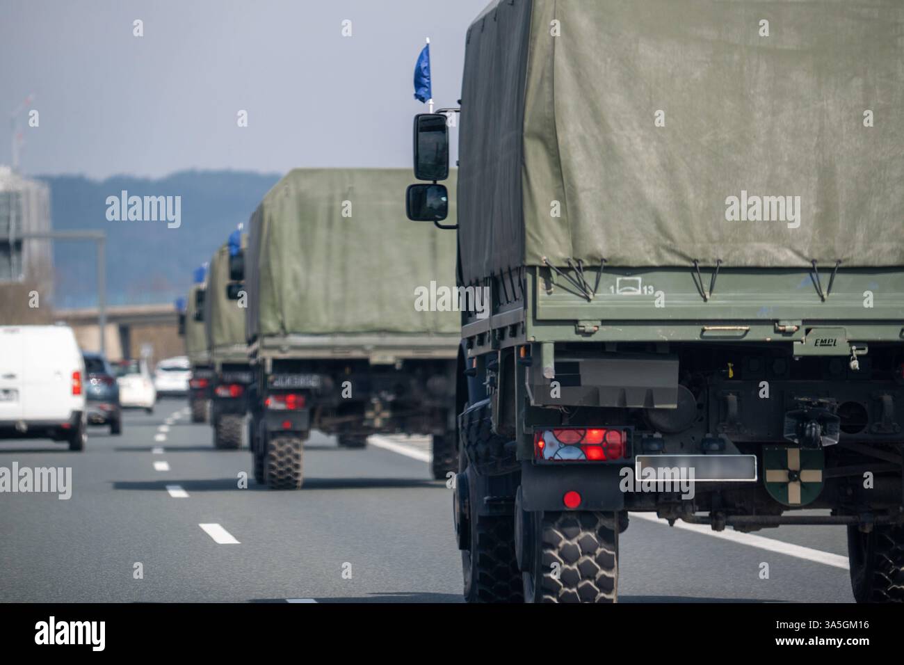 A9, Germany - March 23, 2025: Lithuanian military trucks with ...