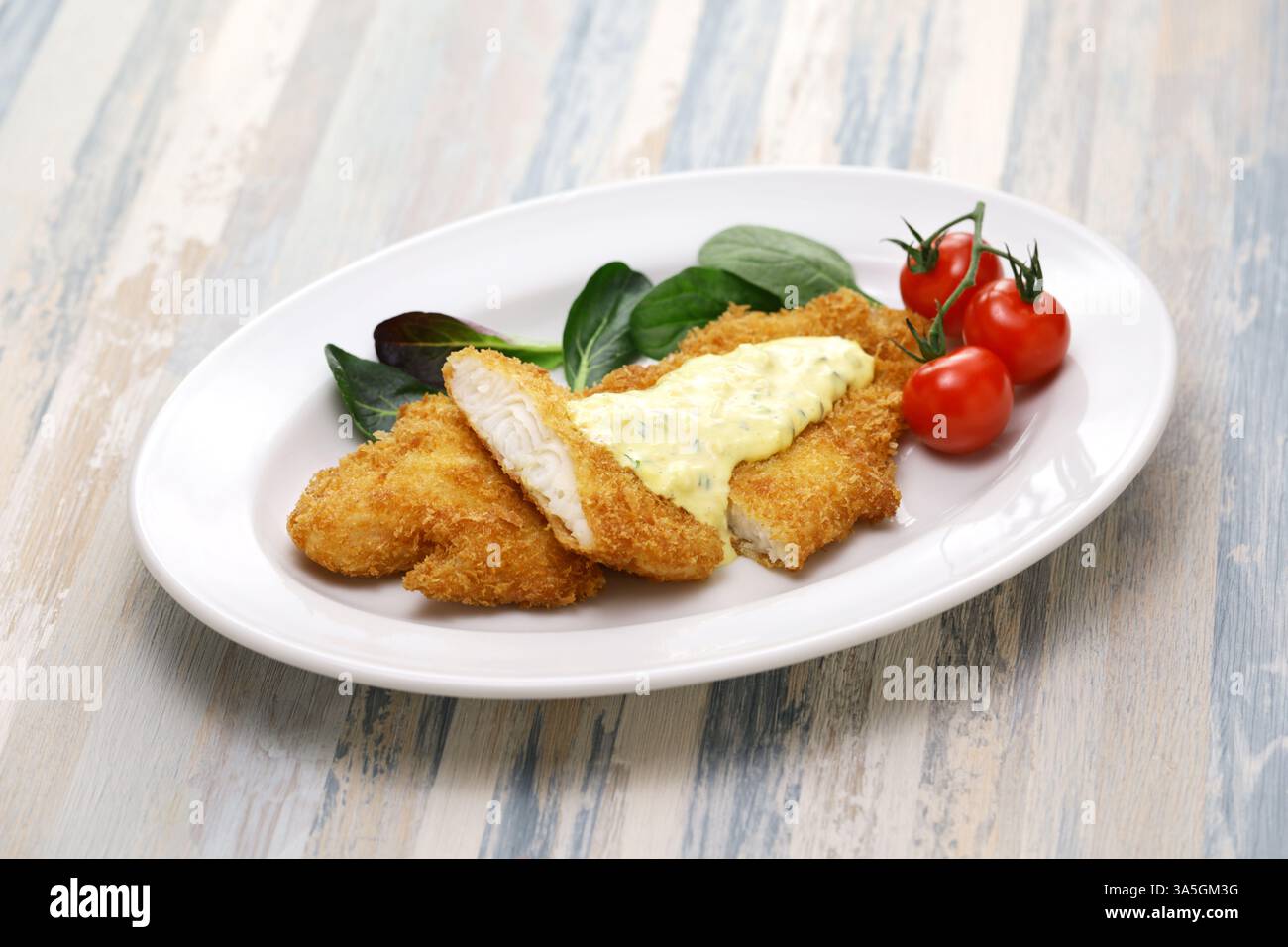 fried basa fish fillet with tartar sauce Stock Photo - Alamy