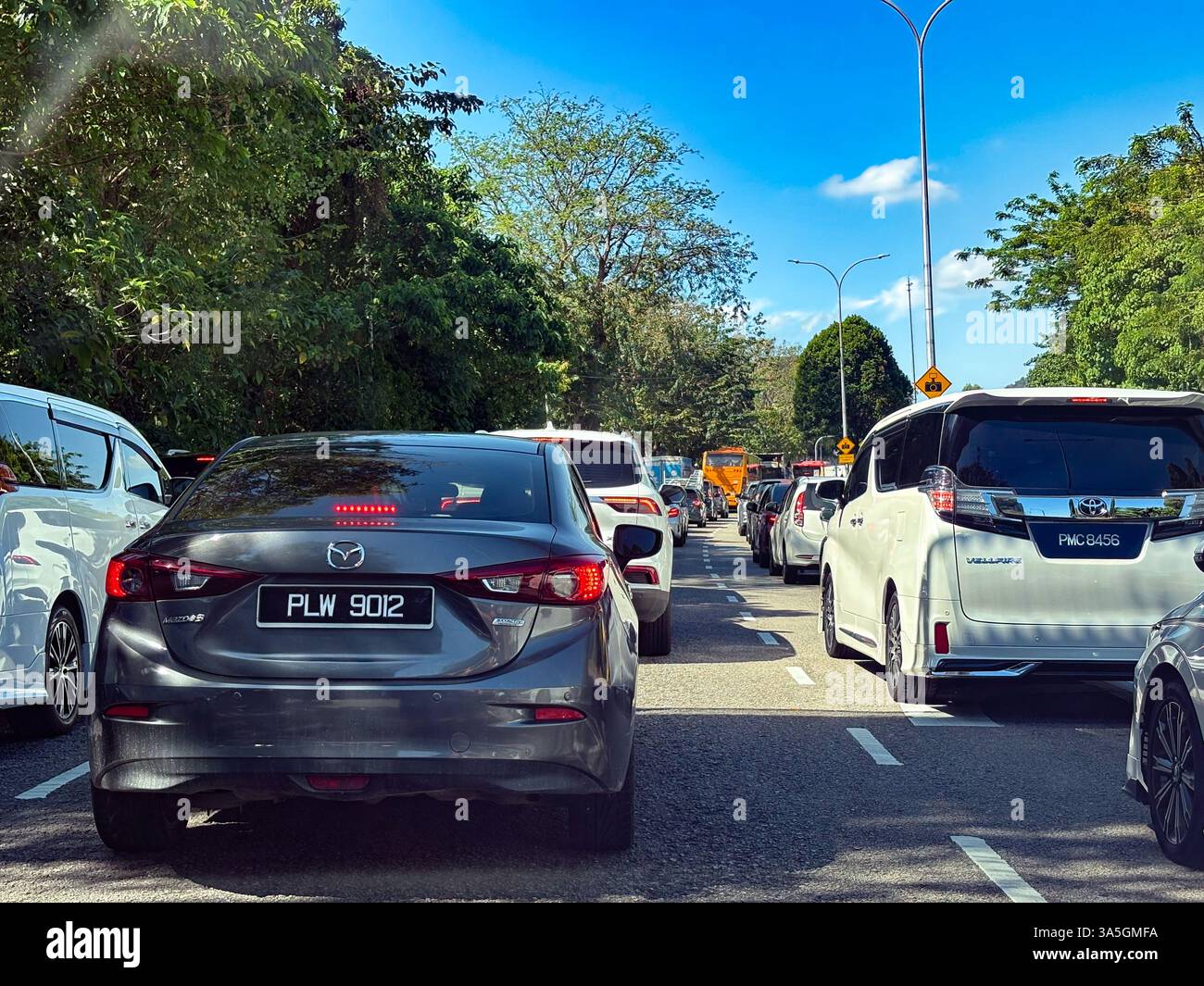 Congested road with cars and buses during traffic in Penang, Malaysia ...
