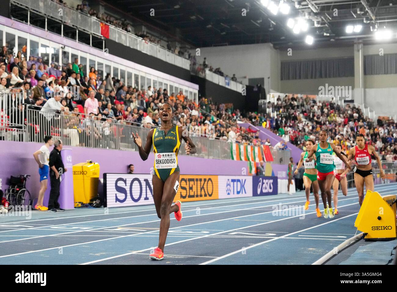 Prudence Sekgodiso, of South Africa, crosses the finish line to win the ...