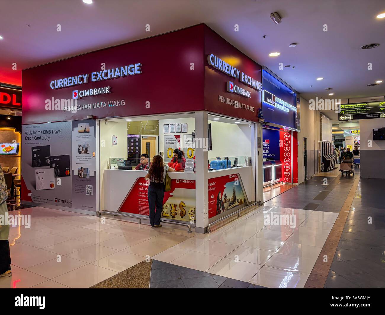 Currency exchange desk in Penang International Airport, Malaysia. CIMB ...