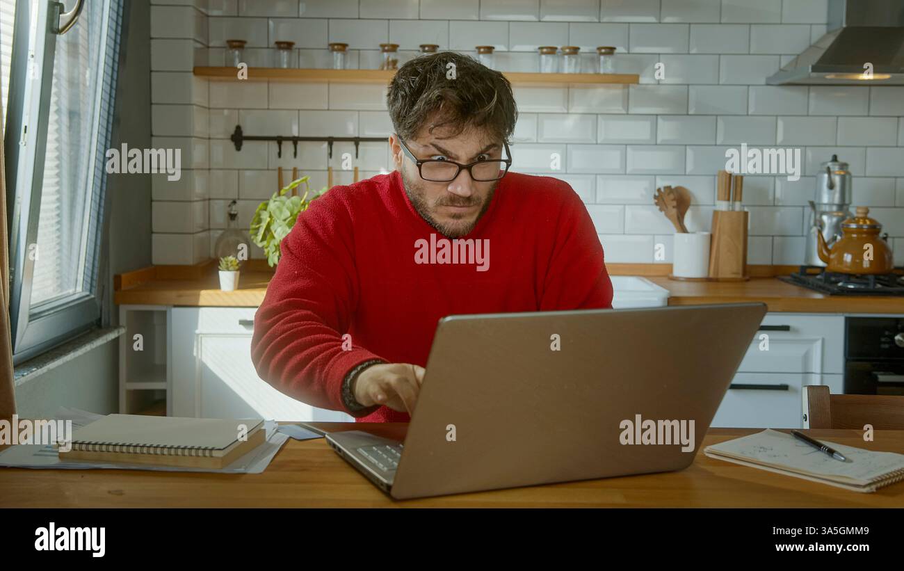 Angry young Man Yelling at His Laptop in a Modern Kitchen, Dealing with ...