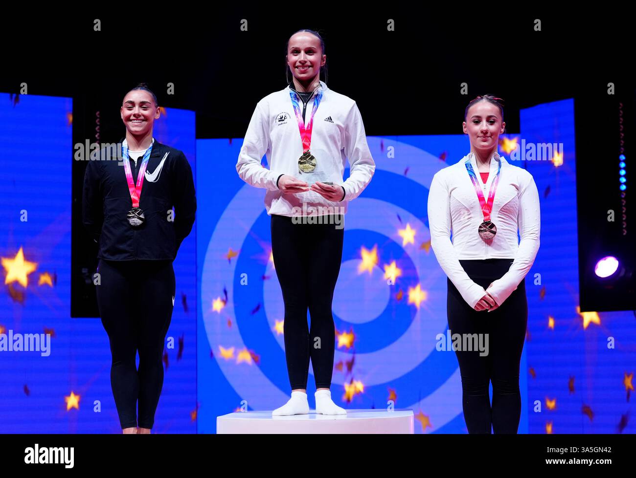 (left to right) Jessica Gadirova with the silver medal, Emily Roper ...