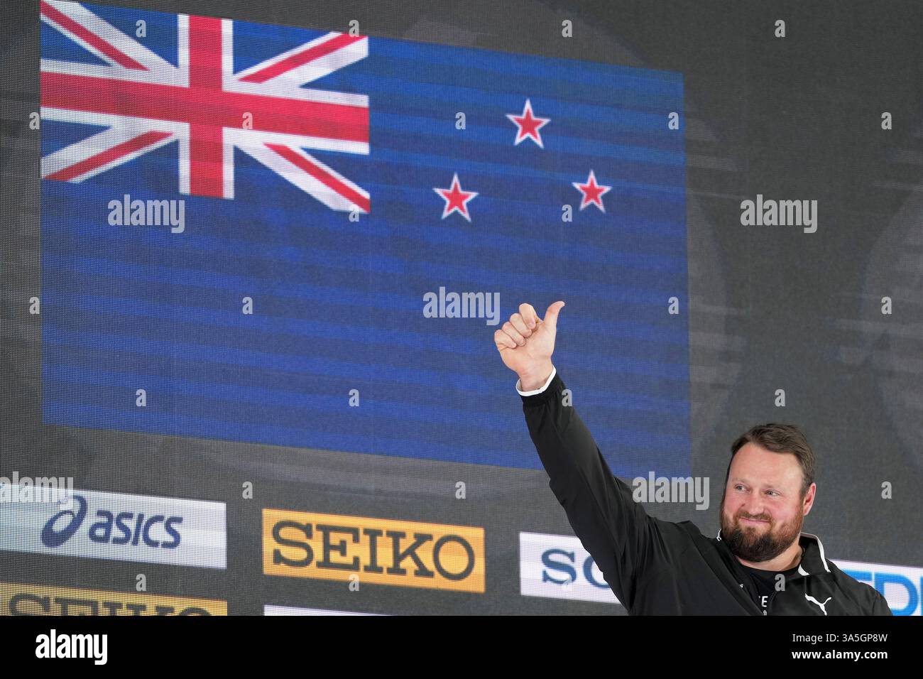 Tom Walsh, of New Zealand, gestures on the podium after winning the ...