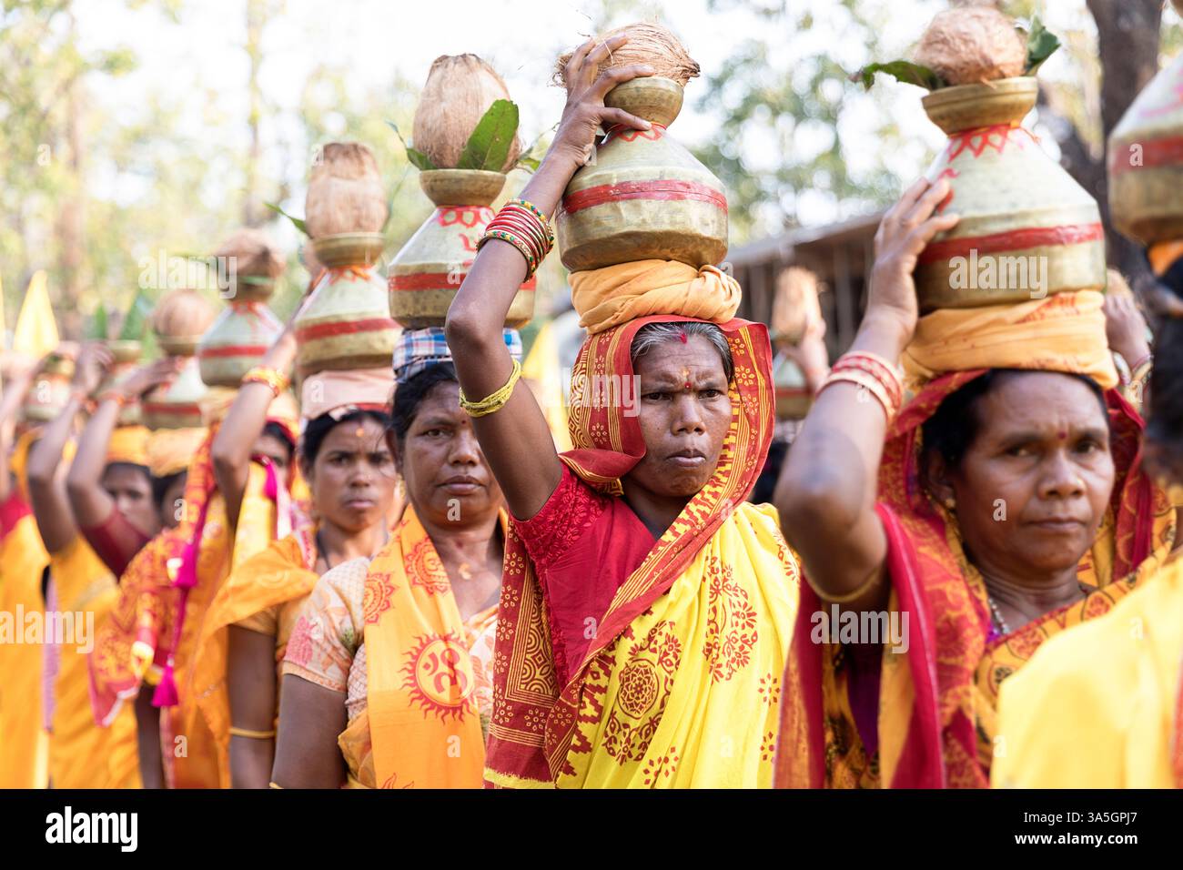 Local religious festival in remote part of Orissa in India, local women ...