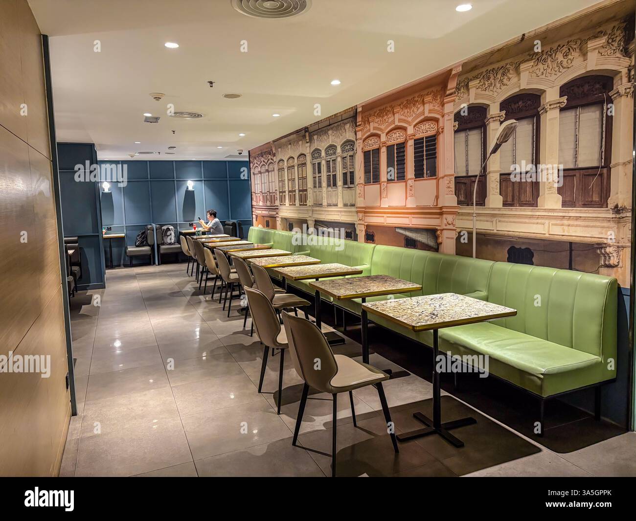 Seating in a lounge area inside Penang International Airport features a ...