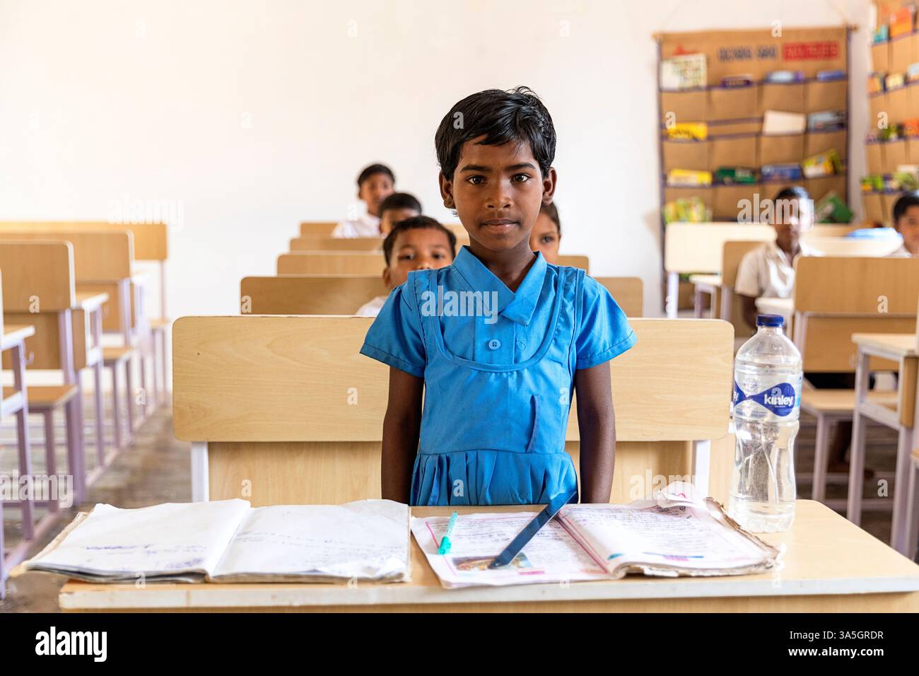 Kids in a classroom at the local primary school in Orissa India, girl ...