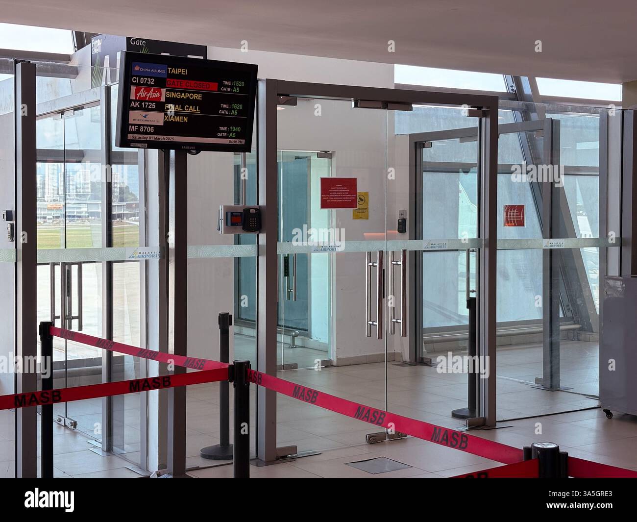 View of empty departure gate inside Penang International Airport in Malaysia. Closed with final ...