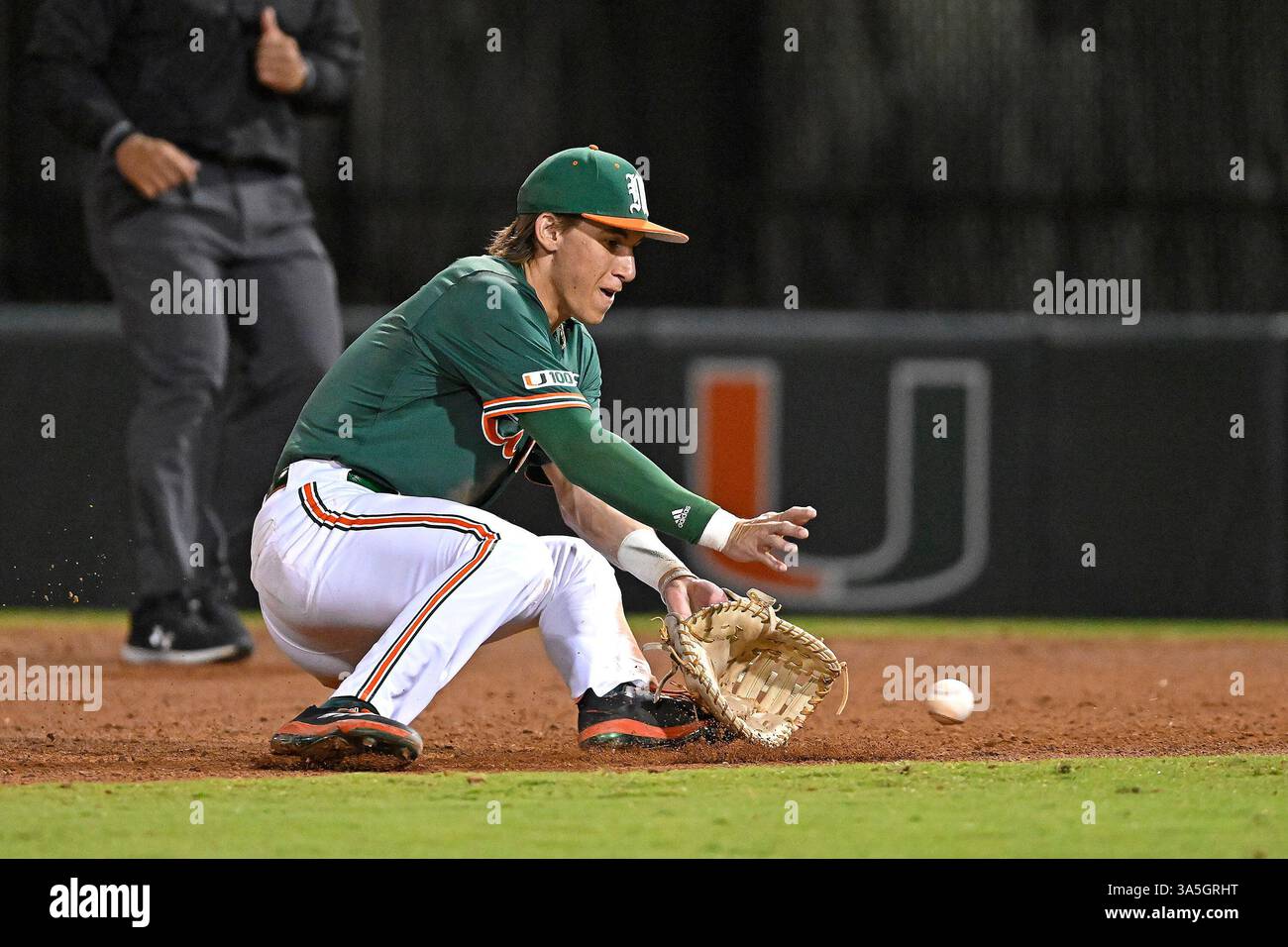 CORAL GABLES, FL - MARCH 22: Miami infielder Jake Ogden (4) fields a ...