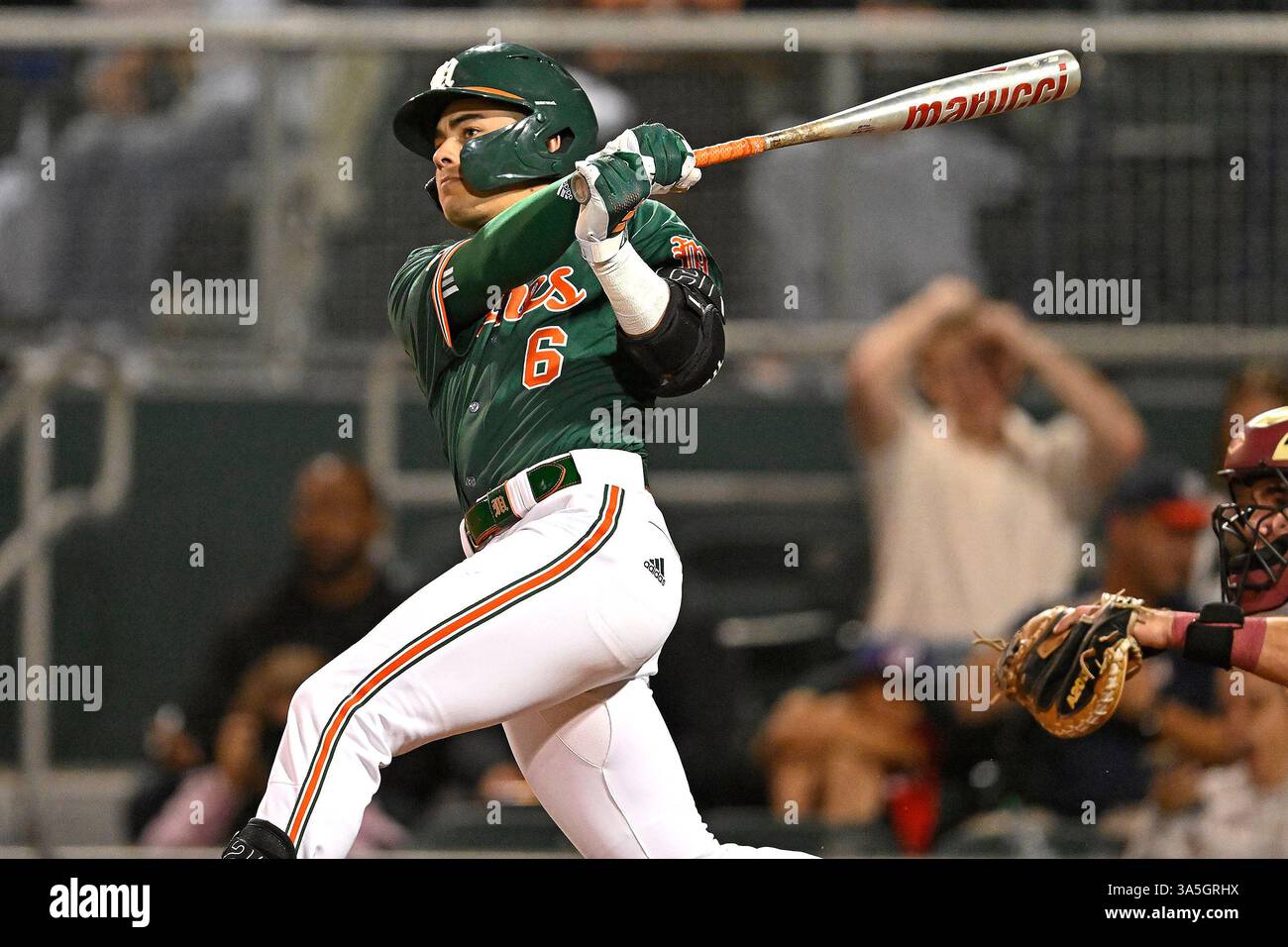 CORAL GABLES, FL - MARCH 22: Miami infielder Brandon DeGoti (6) hits a ...