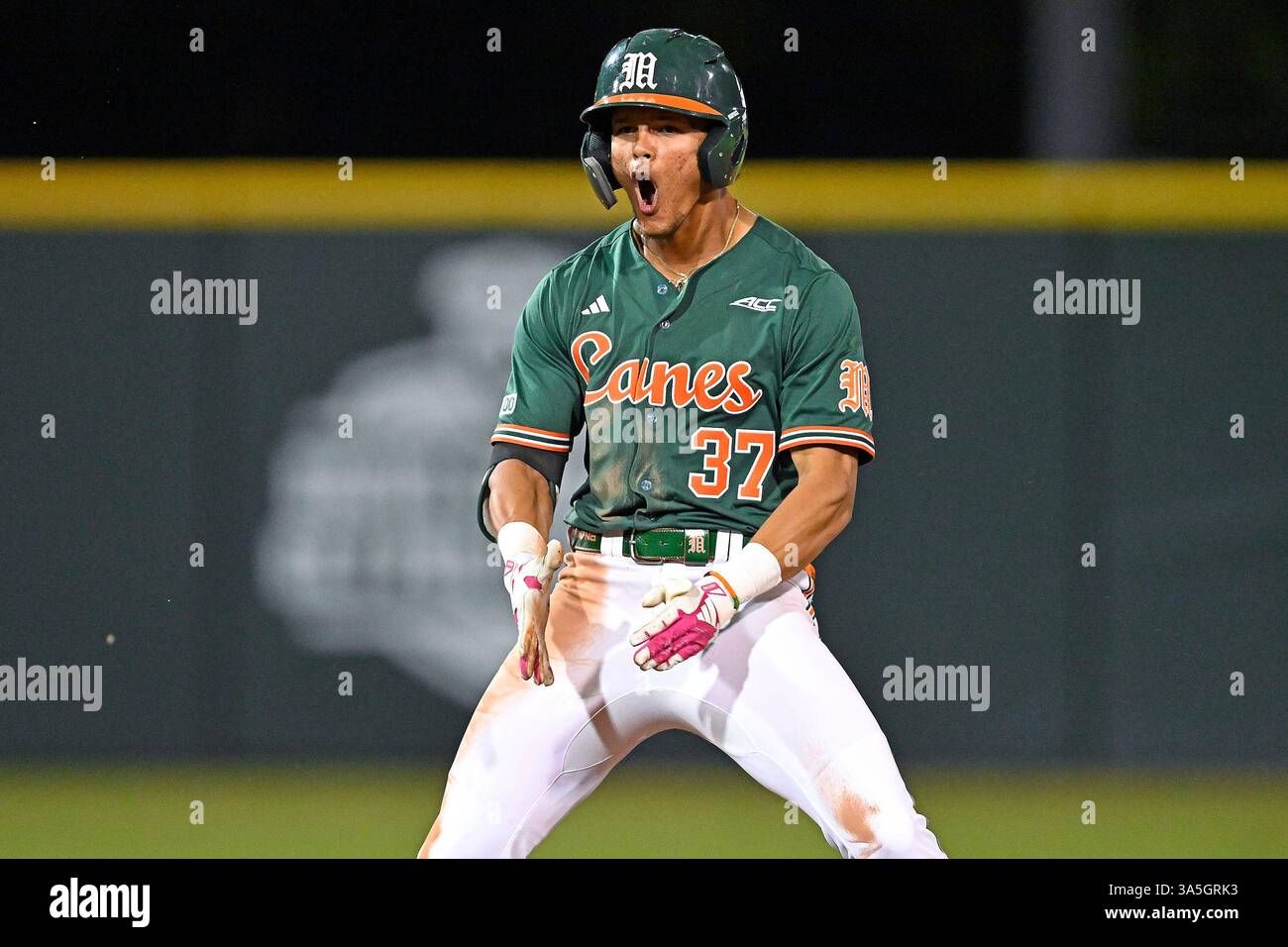 CORAL GABLES, FL - MARCH 22: Miami outfielder Fabio Peralta (37) reacts ...