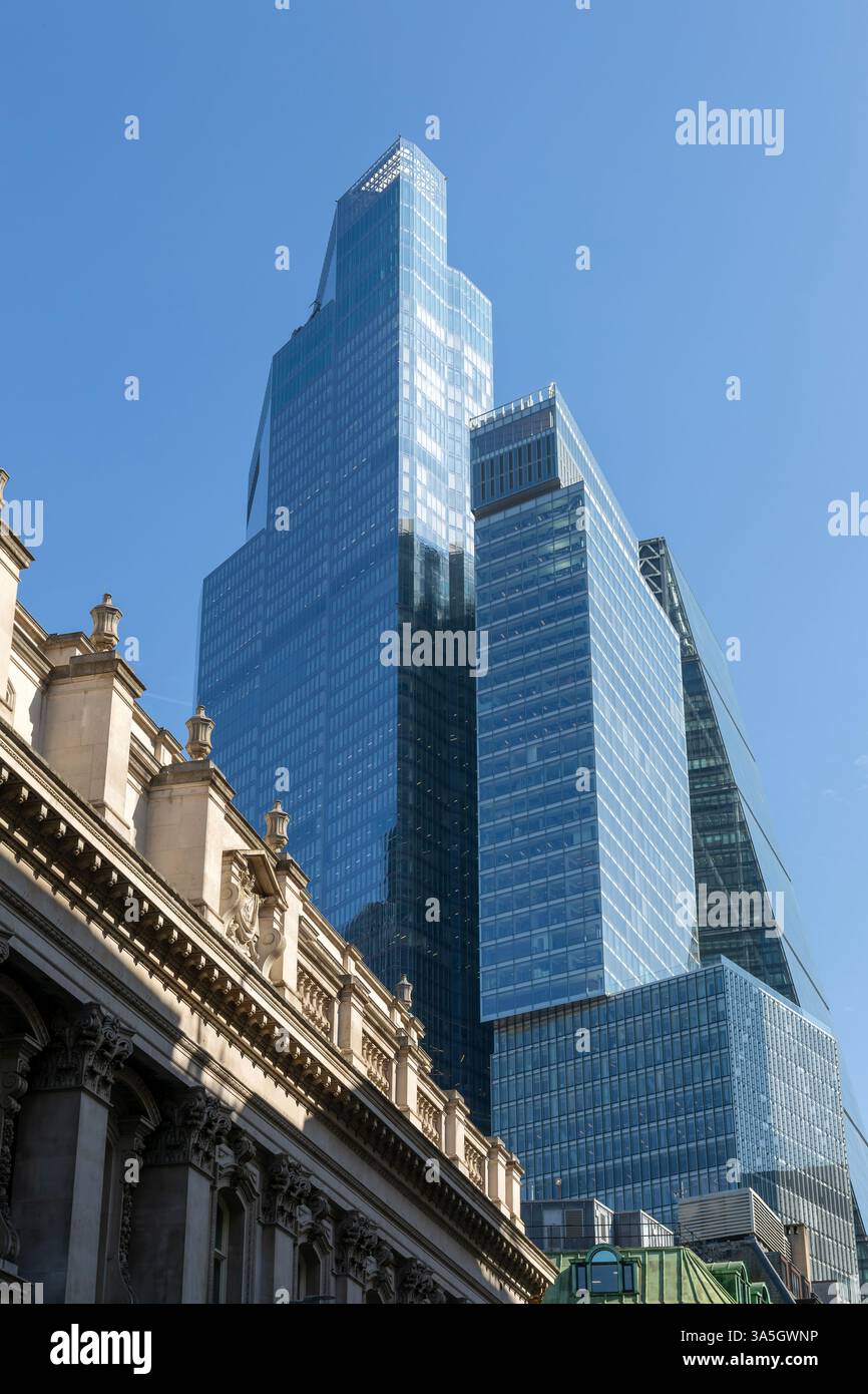 Modern glass fronted skyscraper tower above historic buildings, 22 ...