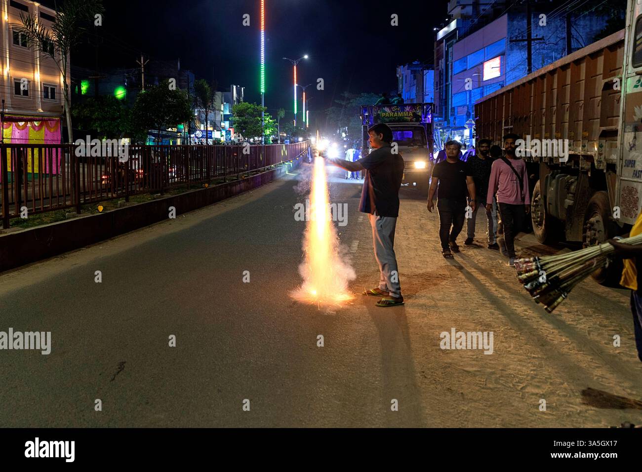 Man firing a rocket on a main street in gunupur while celebrating ...