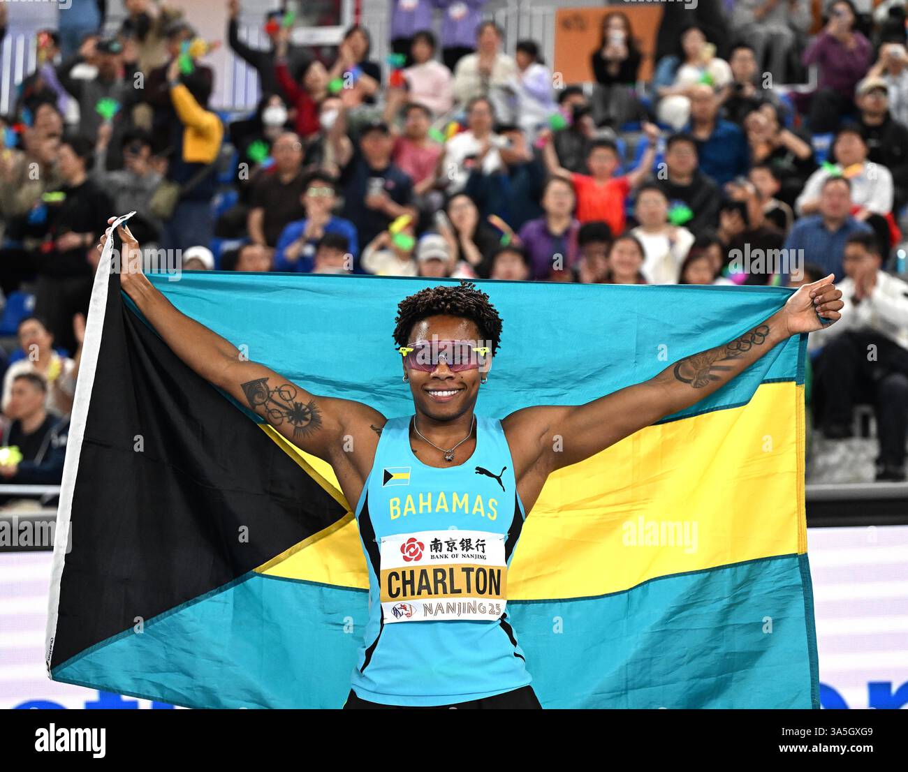 (250323) -- NANJING, March 23, 2025 (Xinhua) -- Devynne Charlton of Bahamas reacts after the ...