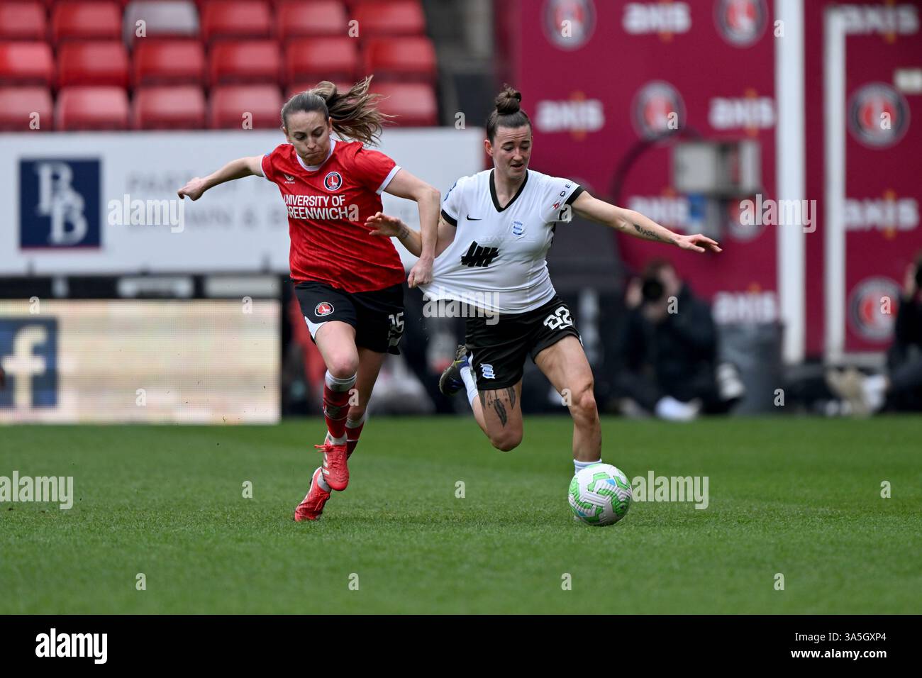 LONDON, UK - 21st March 2025: Kayleigh Barton of Charlton Athletic Women and Rebecca McKenna of ...