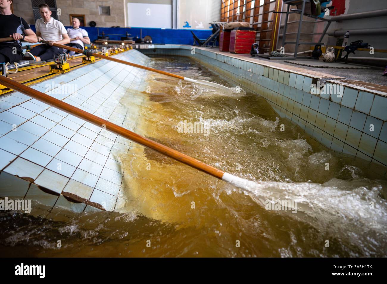 Disciplined synchronized rowers maneuver oars perfecting technique on ...