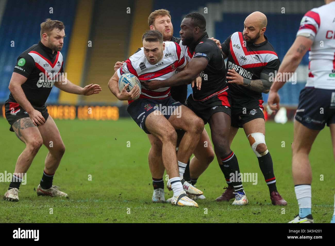 Oldham, England on 23 March 2025. No way through for Ted Chapelhow ...