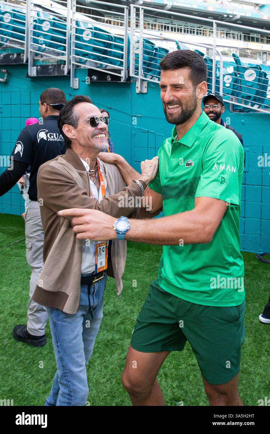 Marc Anthony interacts with Novak Djokovic of Serbia during the Miami ...