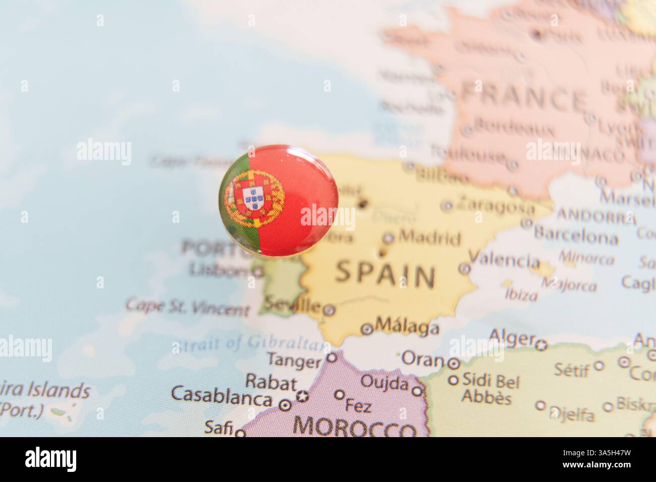 Portugal map with a pin showing the national flag. Close-up view ...