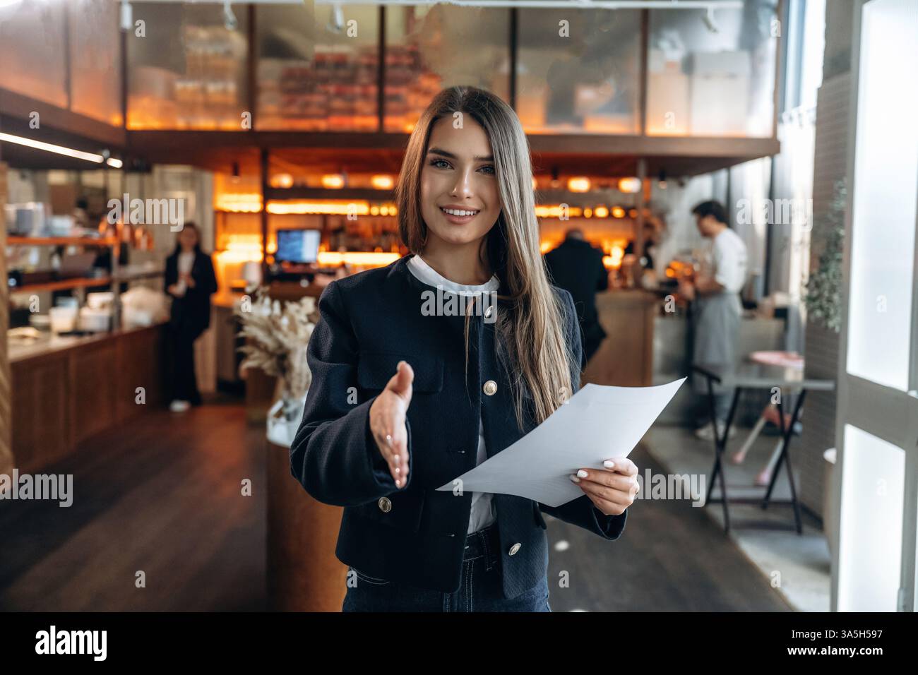 Restaurant owner manager standing hi-res stock photography and images ...