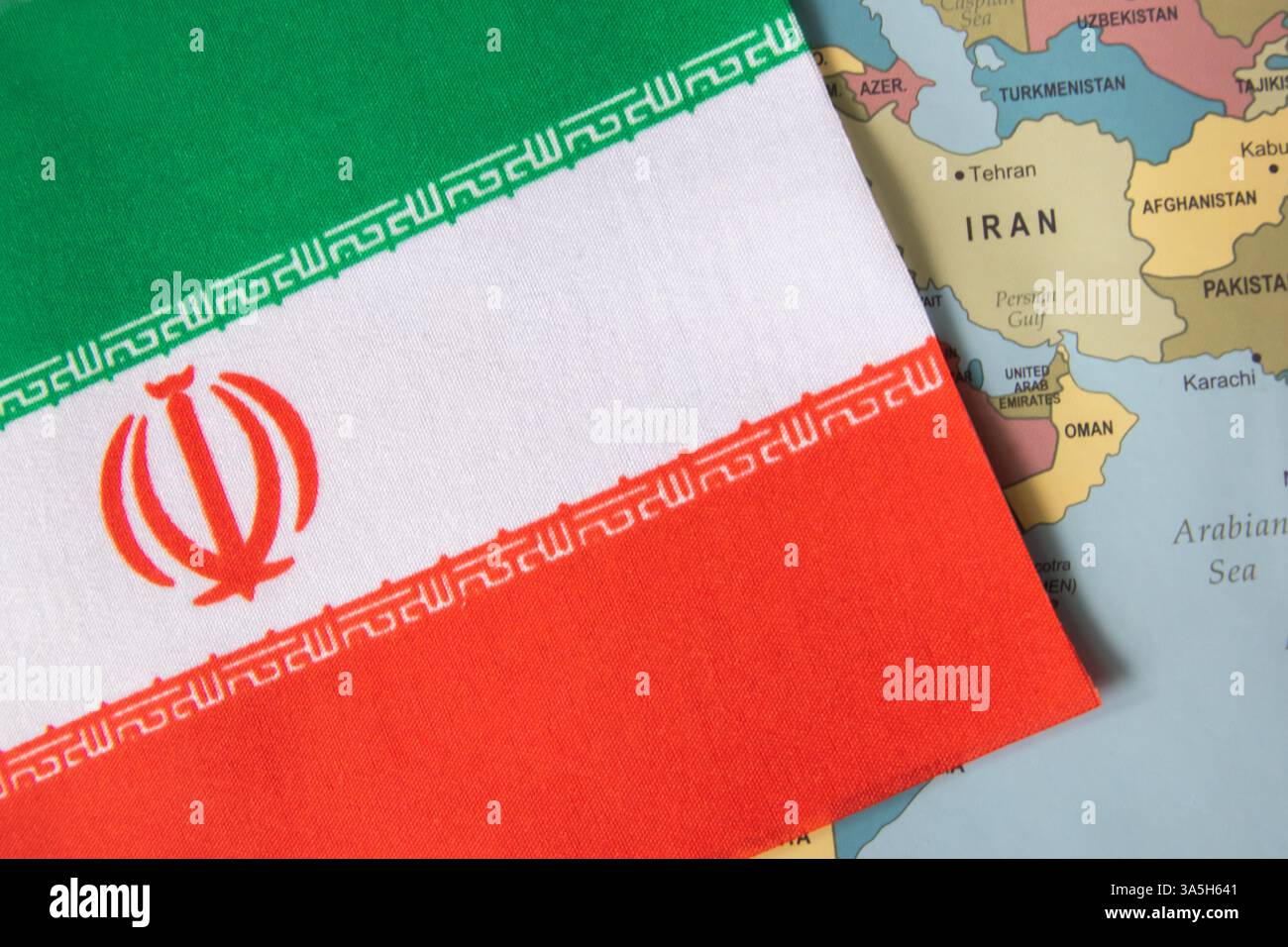 National flag of Iran on the world map background Stock Photo - Alamy