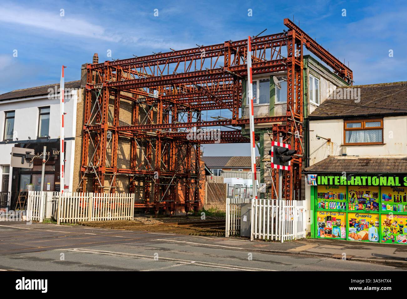 Bamber Bridge signal box being held up by flying shore scaffolding ...