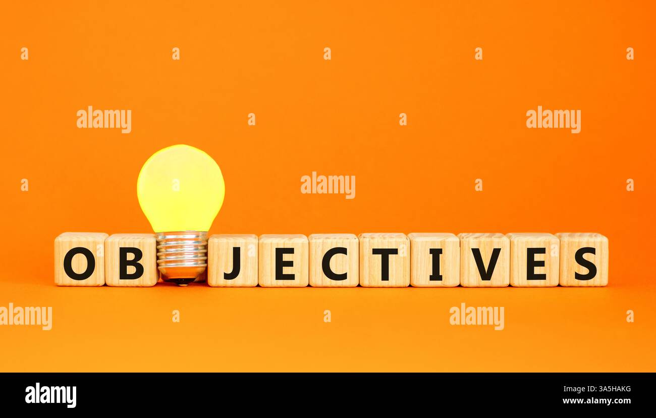 Objectives symbol. Concept word Objectives on beautiful wooden blocks ...