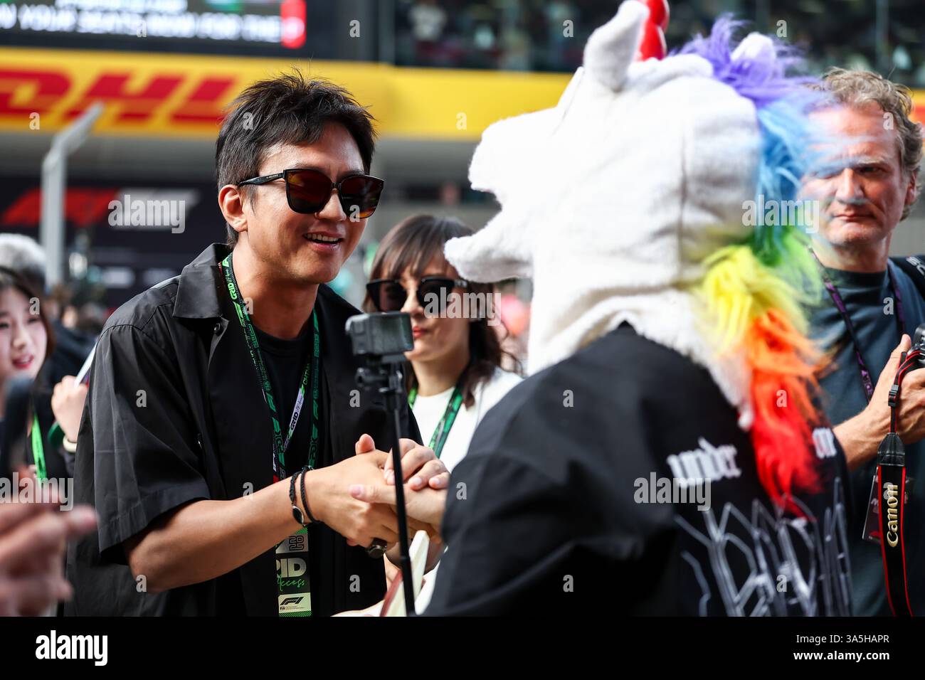 SHANGHAI, CHINA- MARCH 23: Deng Chao and Influencer Xue Zhang during the F1 Grand Prix of CHINA ...