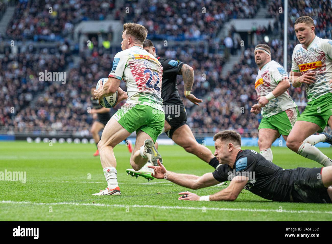 London, UK. 22nd Mar, 2025. Jamie Benson of Harlequins collects the ...